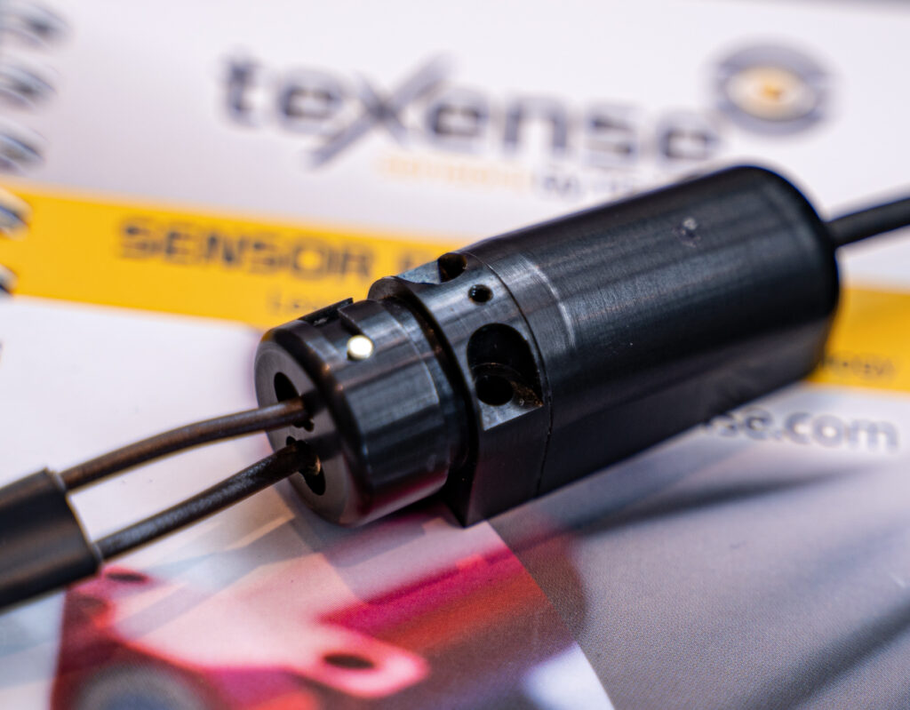 New optical speed sensors and instrumented bolts for motorsport ...